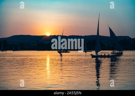Felukka sailing boats on the Nile river near Assuan, Egypt Stock Photo ...