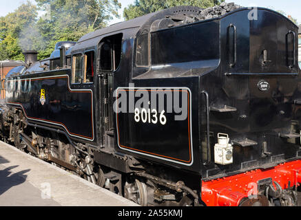 Steam tank engine British railways livery pulling passenger train ...