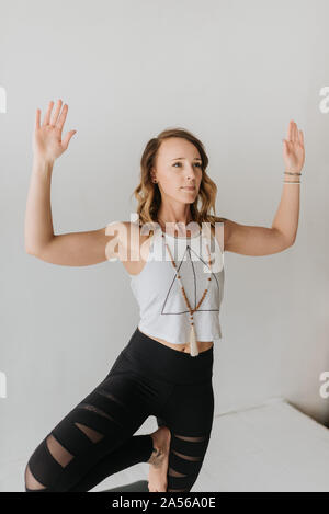 Woman Practising Yoga In Studio Stock Photo - Alamy