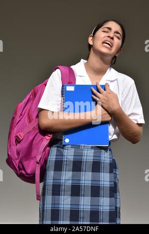 Confused Female Student Wearing School Uniform Stock Photo - Alamy