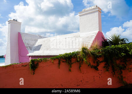 Pink is the favorite color of Bermuda. House and wall in St. Georges ...