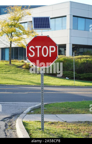 solar powered stop sign outdoor in a business office area Stock Photo ...