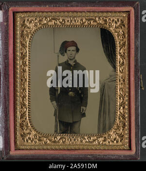 Unidentified soldier in uniform smoking a cigar Stock Photo - Alamy