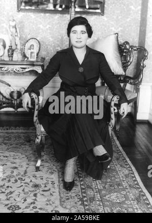 Amy Castles, full length portrait, seated, facing front. Australian ...