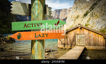 Street Sign the Direction Way to Active versus Passive Stock Photo - Alamy