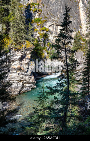 Canoe at Two Jack Lake at Sunrise, Banff National Park, Alberta, Canada ...