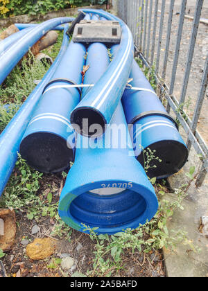 Large blue plastic pipes to transport drinking water Stock Photo - Alamy