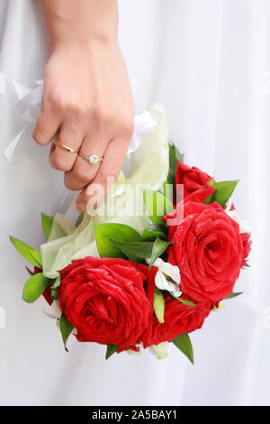 woman detail with a flower in her hands Stock Photo - Alamy