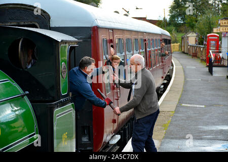 British Rail engine driver and guard on the Norwich to Sheringham line ...