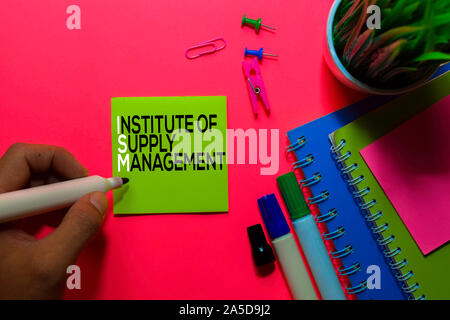 Concept of ISM write on sticky notes isolated on Wooden Table Stock ...