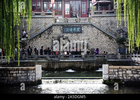 Jinan, China's Shandong Province. 20th July, 2015. Citizens get water ...