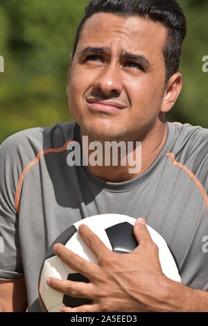Confused Adult Male Soccer Player Stock Photo - Alamy