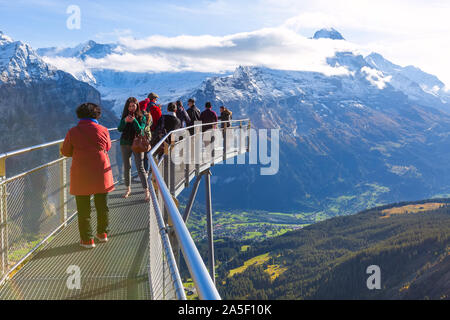 Metal bridge of the Cliff Walk on First mountain with spectacular view ...