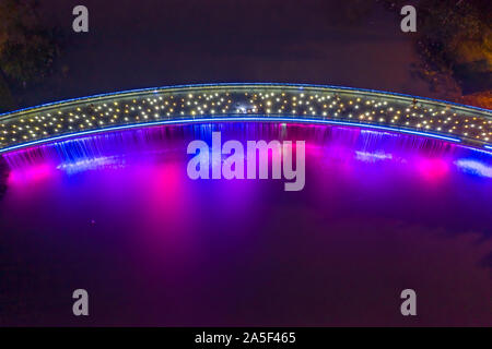 Anh Sao or Starlight Bridge is a pedestrian bridge with waterfall and ...