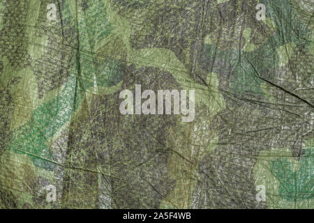 Section of worn camouflage ground sheet / groundsheet material and ...