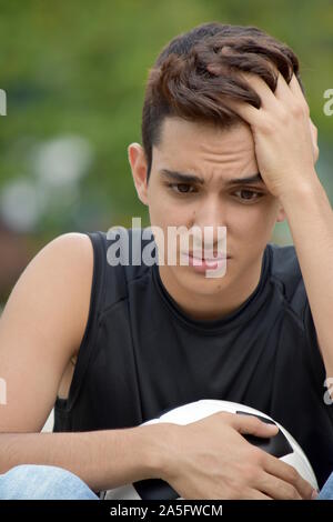 Male Soccer Player And Confusion Stock Photo - Alamy