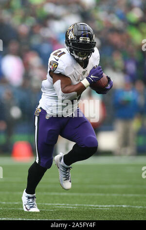 Baltimore Ravens running back Mark Ingram (21) makes a long run against ...