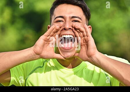 Male athlete yelling Stock Photo - Alamy
