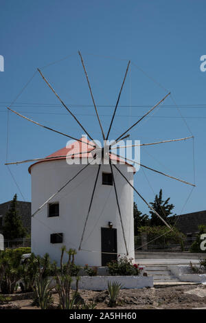 Traditional house in Sigri village, Lesvos island. Coloured doors and ...