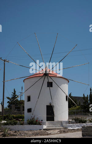 Traditional house in Sigri village, Lesvos island. Coloured doors and ...