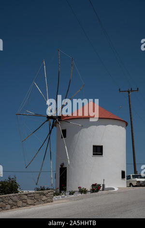 Traditional house in Sigri village, Lesvos island. Coloured doors and ...