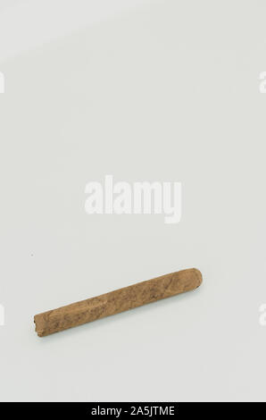 new cigar top view - paper background with copy space Stock Photo - Alamy
