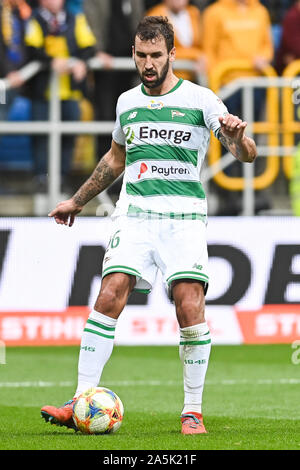 Blazej Augustyn from Lechia Gdansk (L) Kamil Wilczek from Brondby IF (C ...