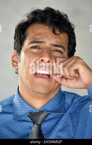 Tearful Minority Man Stock Photo - Alamy