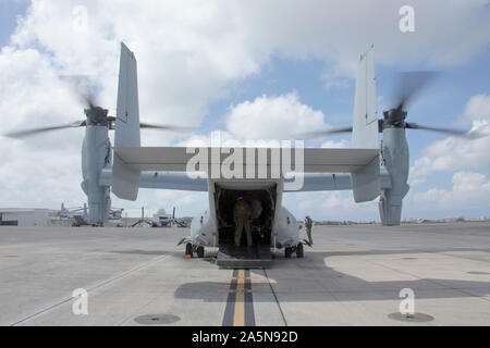 A Joint Precision Aerial Drop System (JPADS) enters a designated drop ...