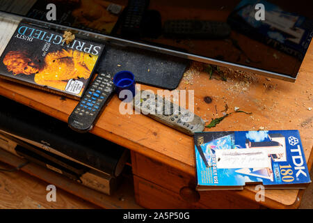 Dirty TV remote Stock Photo - Alamy