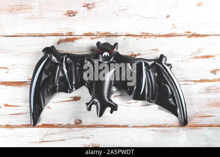 Inflatable black bat as Halloween party decoration concept, top view ...