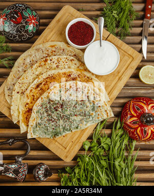 gutab stuffed flatbreads board served with sumac and yoghurt Stock ...