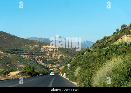 Crete, Greece. October 2019. Following a white police car on the E75 ...