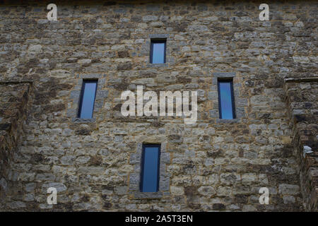 The four windows of ancient building with tree Stock Photo - Alamy