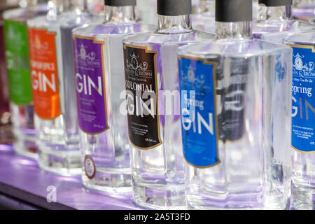 Gin bottles display Stock Photo - Alamy
