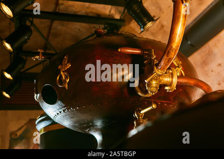 Detalis of medieval traditional distiller cube made from copper ...