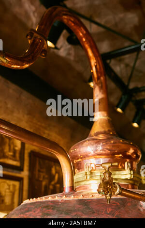 medieval traditional distiller, cube made from copper production of ...