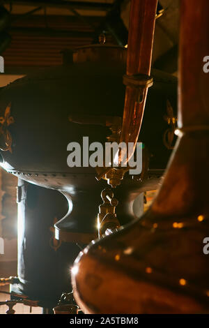 Detalis of medieval traditional distiller cube made from copper ...