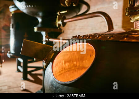 Detalis of medieval traditional distiller cube made from copper ...