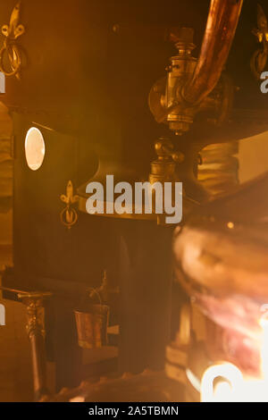 Detalis of medieval traditional distiller cube made from copper ...