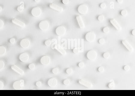 pills flat background, tablets spreaded on a us dollar banknotes - top ...
