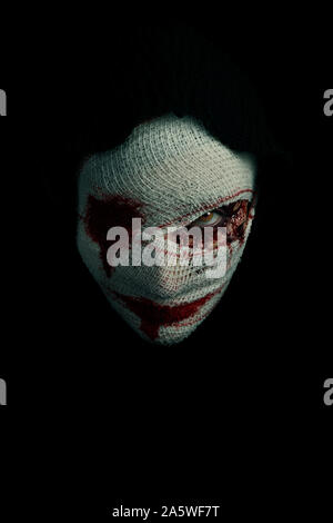 Scary woman with bloody bandages in a black background Stock Photo - Alamy