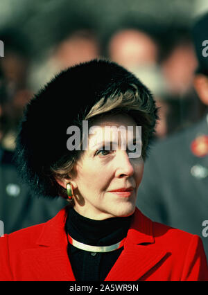 First lady Nancy Reagan, wearing a pants outfit designed by Galanos ...