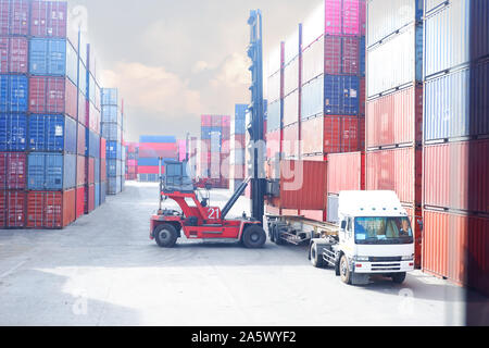 Container handlers in the harbor Work for import and export Stock Photo ...