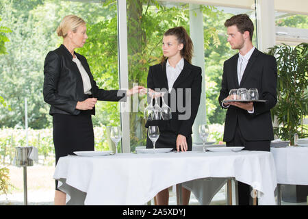 apprentices and teacher learing their trade Stock Photo - Alamy