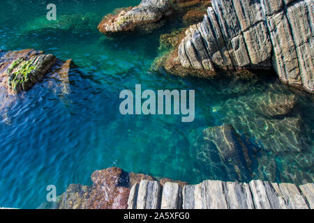 Rocks among the turquoise sea. Seascape, top view. Waters of the ...