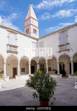 Cloistered courtyard of medieval St. Francis monastery in Pula, Croatia ...