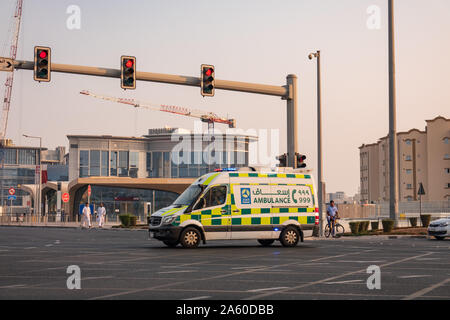 A first-response ambulance vehicle makes its way across a traffic ...