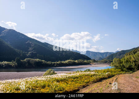 A serene view of the Shimanto River in Shikoku, Japan, where a simple ...