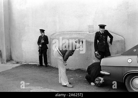 RUC officer armed patrolling street of Belfast during riots immediately ...